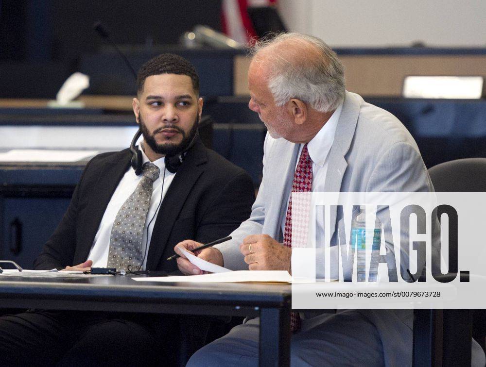 Palm Beach, Florida, U.S. - Raul Andino, left, and his attorney Michael Maher listen to jury