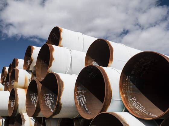 Shaunavon, Saskatchewan, Canada - Stacks of stored 36-inch pipeline ...