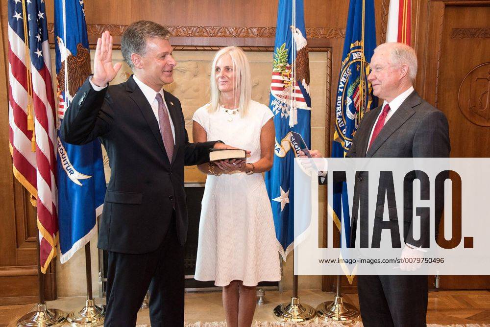 FBI Director Chris Wray, accompanied by his wife, Helen Garrison Howell ...