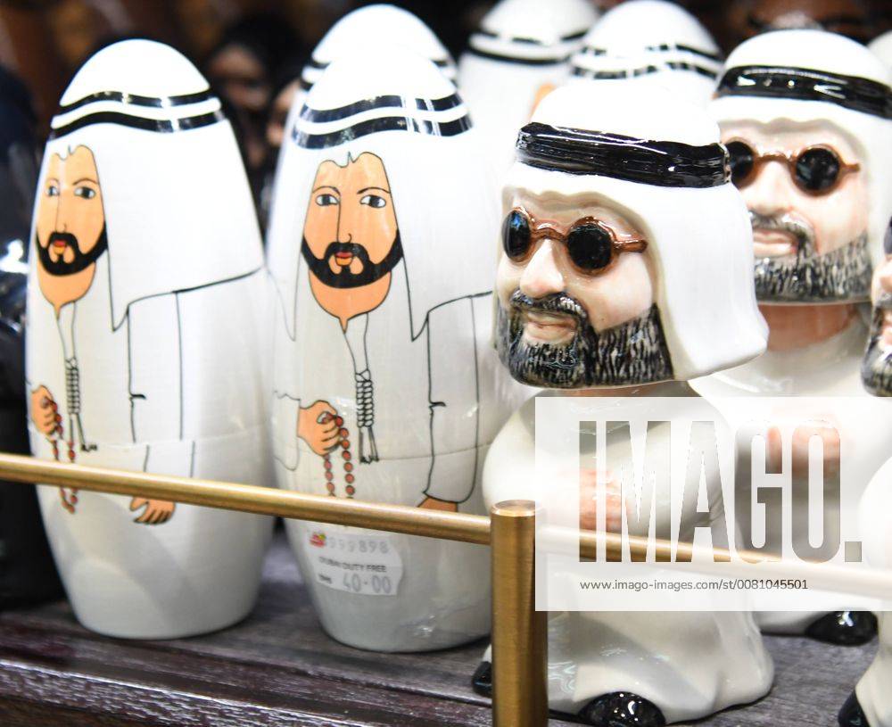 Souvenirs at the Dubai International Airport are small sheikh figures ...