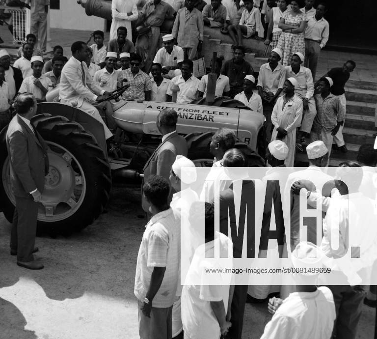 JUMA ABADHAR AND BRIAN ECCLES WITH A TRACTOR - GIFT TO ZANZIBAR FROM ...