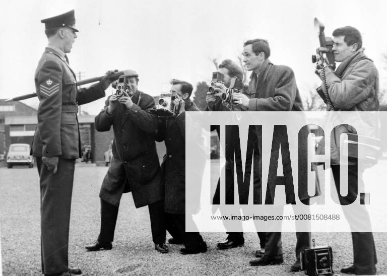 GRAISISON J STAFF SERGEANT AT CHICHESTER BARRACKS BEING PHOTOGRAAPHED ...