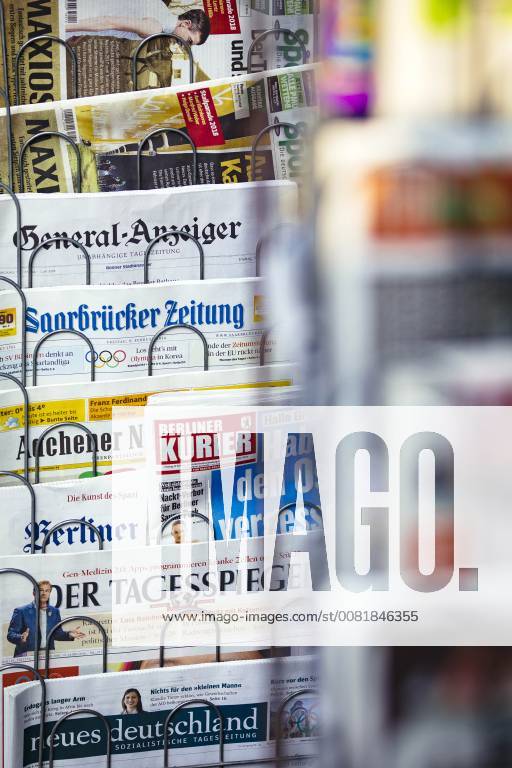 A newspaper stand with newspapers at a kiosk on the Cologne ring Cologne