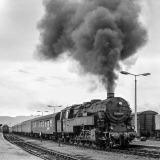 Steam locomotive 95 0040 at the departure with a passenger train ...