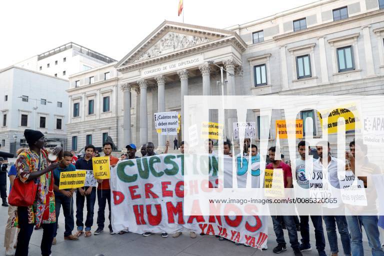 Participants hold a banner reading Human Rights Matter: Frontier Policy ...