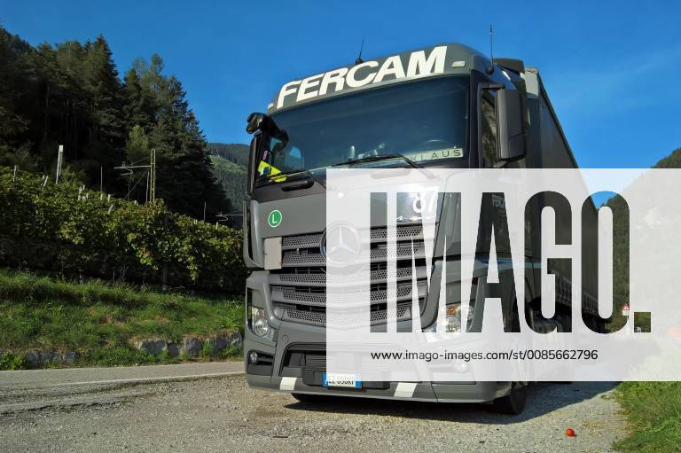 A Mercedes Actros semitrailer with tarp trailer by the Fercam shipping ...