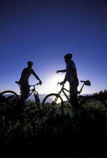 Todd Offenbacher and Brad Jackson take a break while mountain biking ...