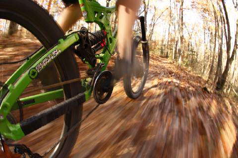 Bike mounted camera view of Adam Stephens riding his mountain bike ...