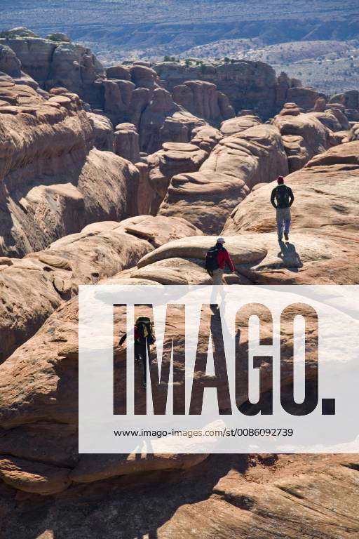 Briana Ratterman, Dallas Golz, and Mark Trevithick hiking in the Fiery ...