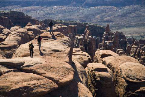 Briana Ratterman, Dallas Golz, and Mark Trevithick hiking in the Fiery ...