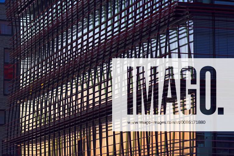 Modern high-rise facade with balconies in evening light Berlin Germany ...