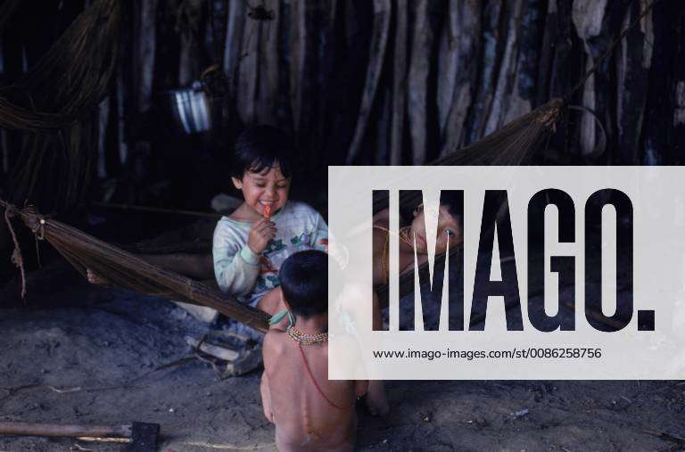 Vanessa Good, daughter of Yarima and anthropologist Ken Good, sits in a ...