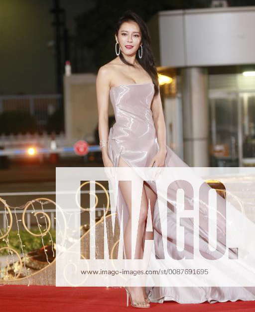 HONG KONG, CHINA - DECEMBER 16: Actress Kelly Cheung poses on the red ...