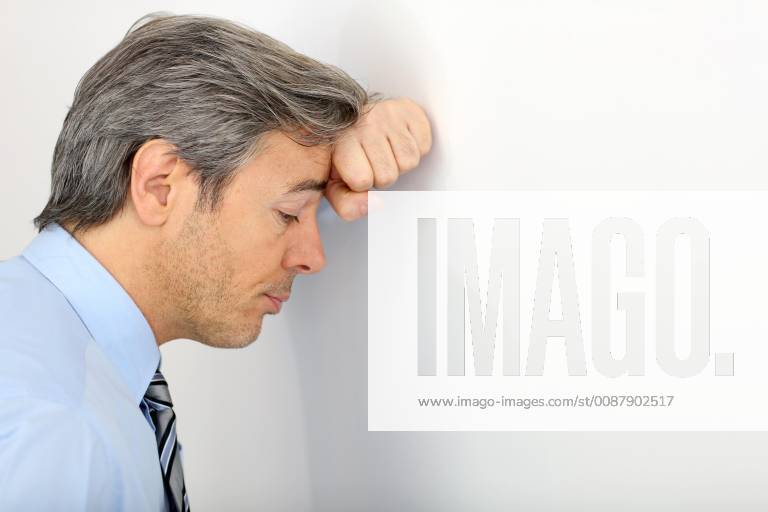 Portrait of mature depressed businessman, isolated model released ...
