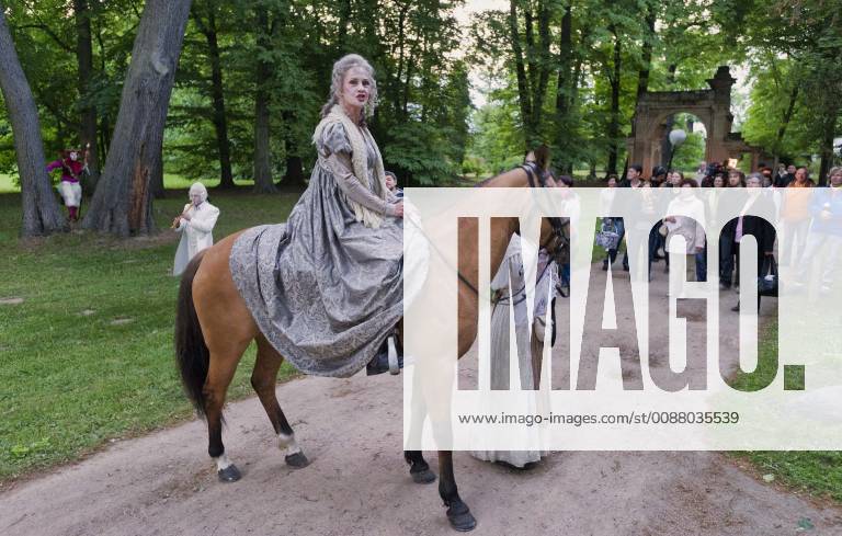 The actress Christel Ortmann sits on a horse on Friday