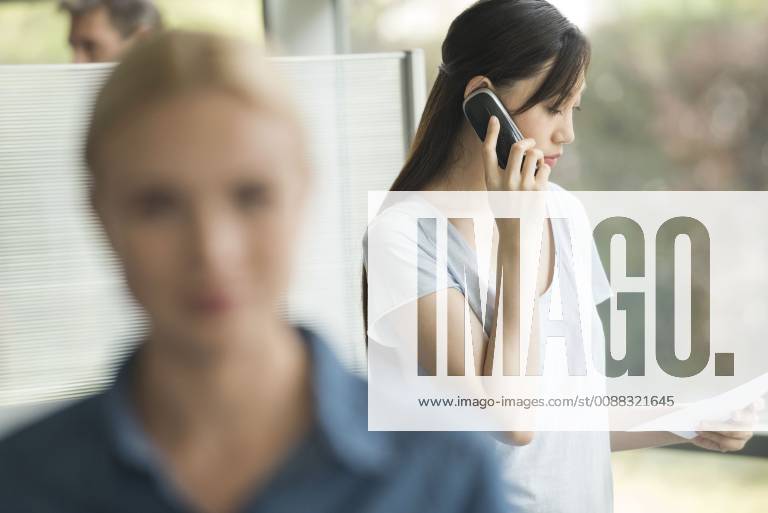 Office worker making phone call