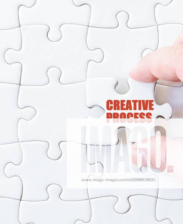 Missing jigsaw puzzle piece with words CREATIVE PROCESS