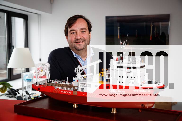 GEOxyz s CEO Patrick Reyntjens poses with a model boat, at the ...