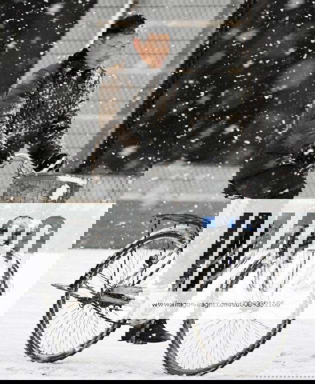 Scene from Pyongyang A man rides a bicycle in the snow in Pyongyang on Feb