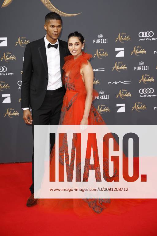 Naomi Scott and her husband Jordan Spence at the Aladdin Film Premiere ...