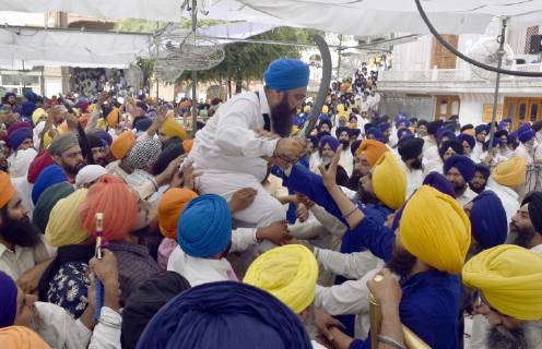 AMRITSAR, INDIA - JUNE 6: Members of various hardliner Sikh ...