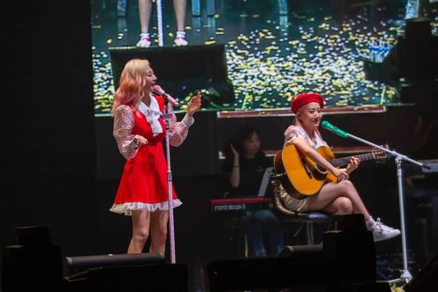 Ahn Ji-young and Woo Ji-yoon of South Korean duo Bolbbalgan4 perform ...
