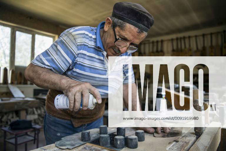 CHECHNYA, RUSSIA - JUNE 19, 2019: Master Khasan Bazayev makes phandar ...
