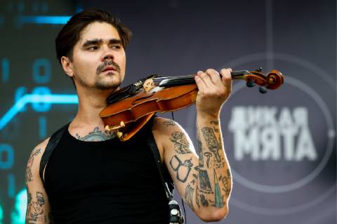 TULA REGION, RUSSIA – : Yuri Muzychenko of The Hatters folk band ...