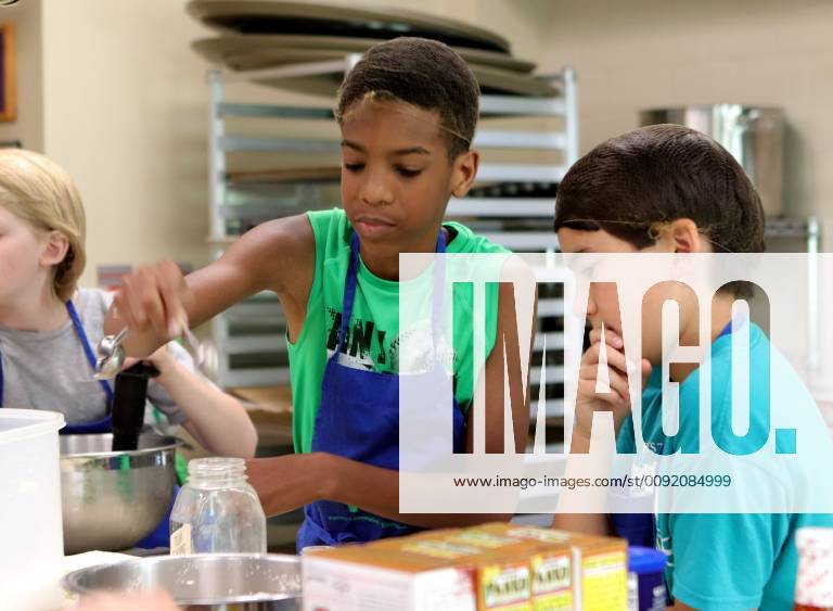 June 18, 2019 - MO, USA - Harrison Killion, 12, left, and Samuel Sha ...