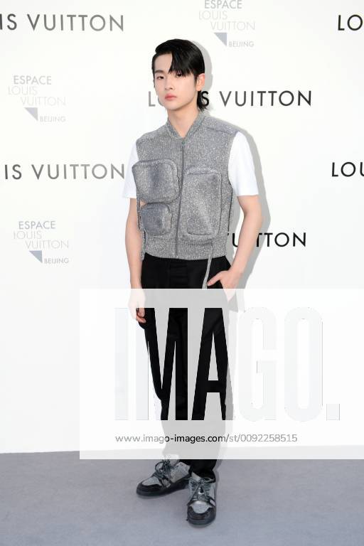 Chinese rapper and singer Zhou Zhennan of idol boy band R1SE attends a ...