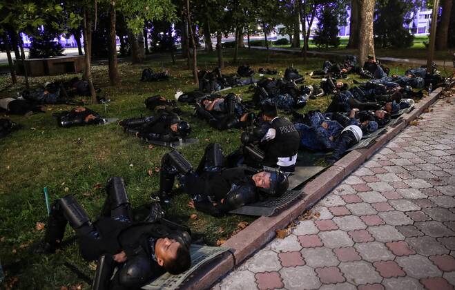BISHKEK, KYRGYZSTAN - AUGUST 9, 2019: Riot police officers having rest ...