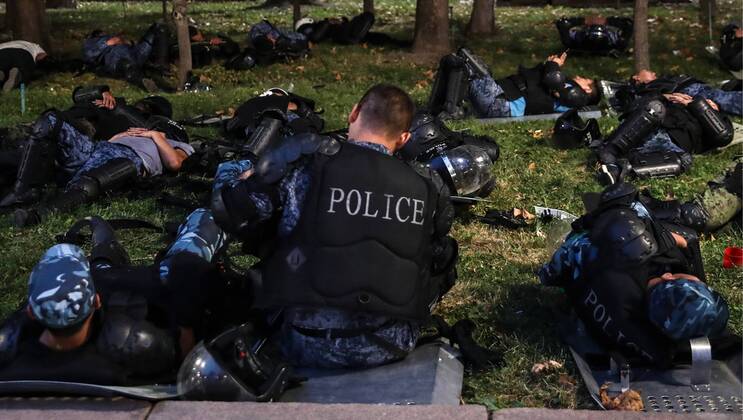 BISHKEK, KYRGYZSTAN - AUGUST 9, 2019: Riot police officers having rest ...
