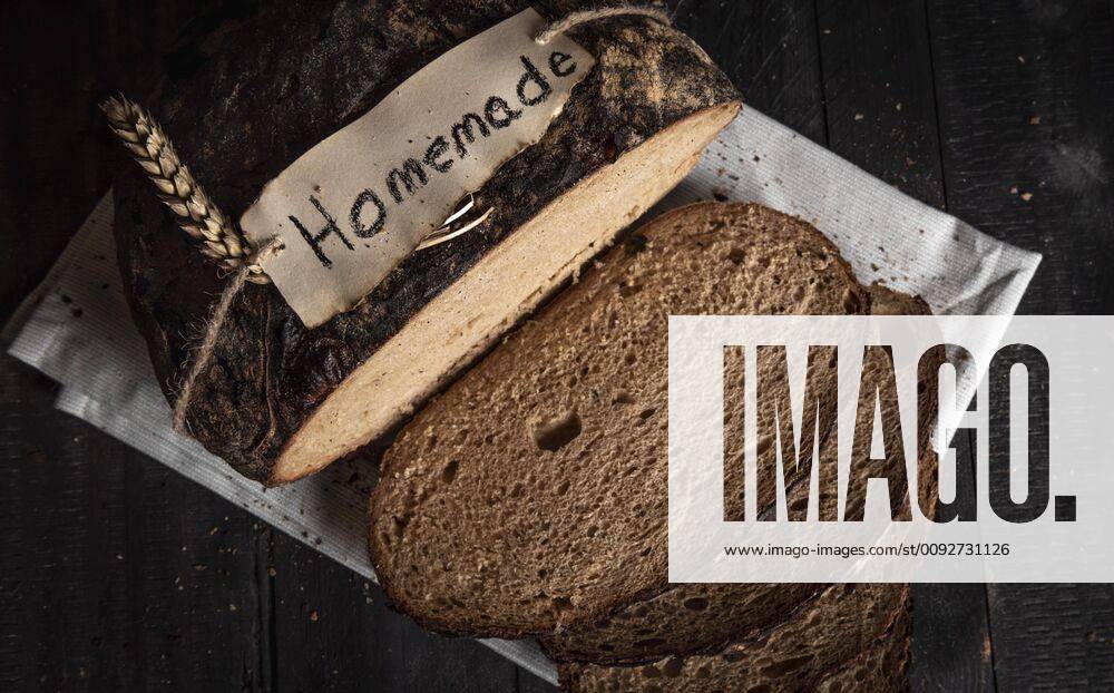 Traditional german rye-bread in low light. Crusty bread above view