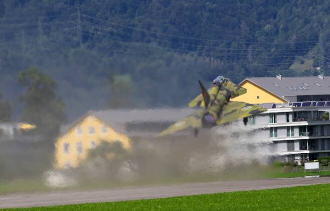 A two-seater, Swedish Saab SK 37E Viggen takes off from Mollis airfield ...