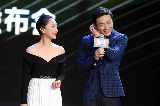 Chinese actress Zhou Xun, left, and actor and director Zu Feng attend a ...