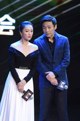 Chinese actress Zhou Xun, left, and actor and director Zu Feng attend a ...
