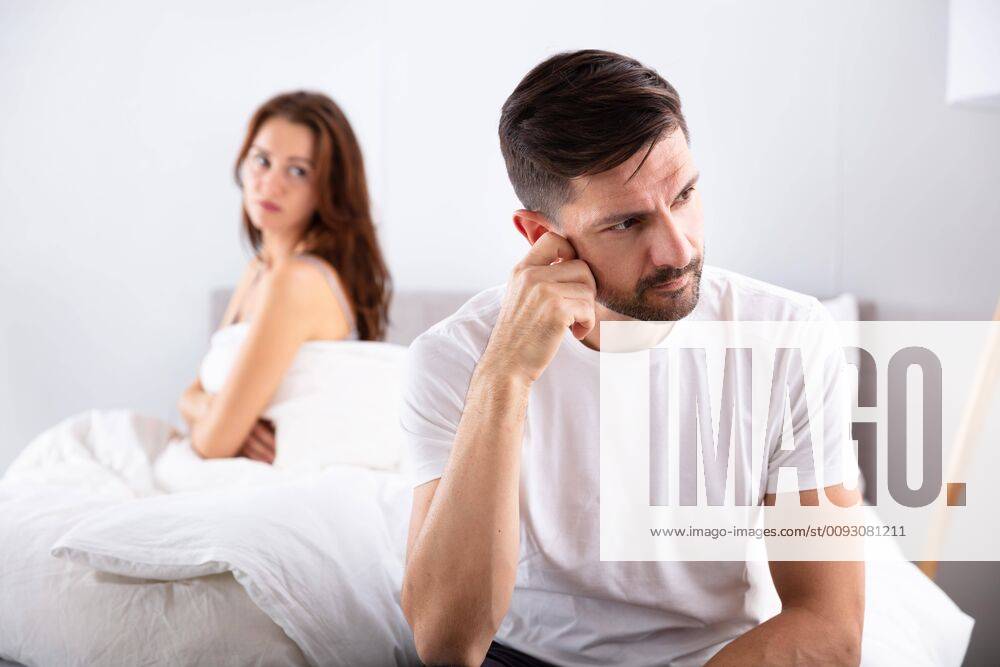Depressed Man Sitting On Bed Model Released Symbolfoto Y