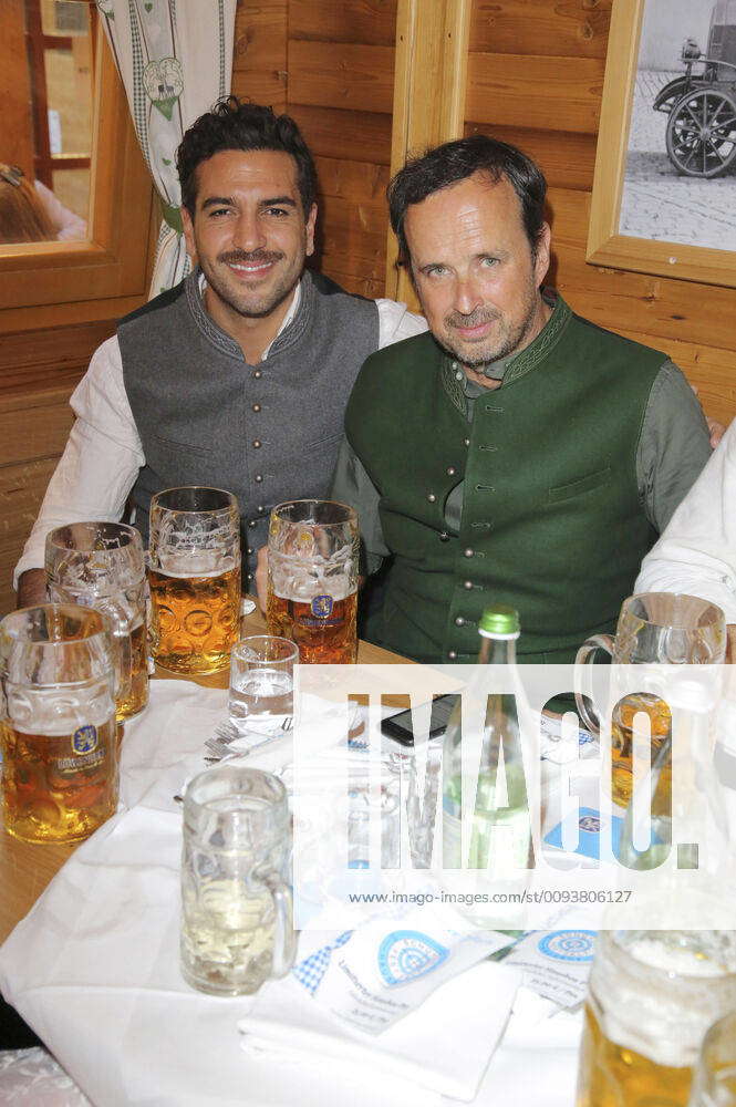 Elyas MBarek with guest in the Schützen marquee at the Oktoberfest 2019 Munich