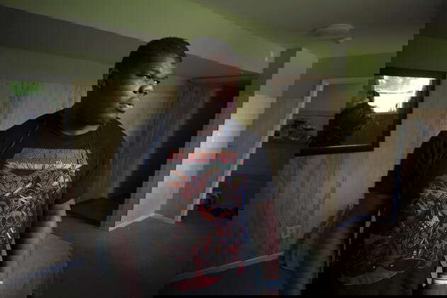 Hampton, GA: Mikaiah Epps, 20, in his sparsely furnished bedroom in a ...