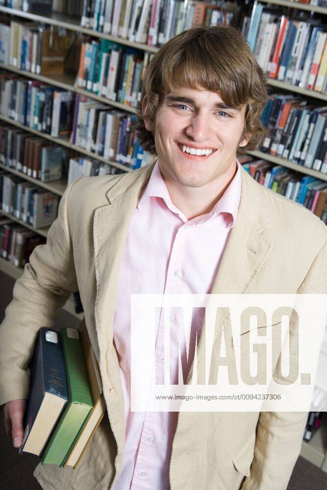 Male University student in library, portrait,model released, Symbolfoto ...