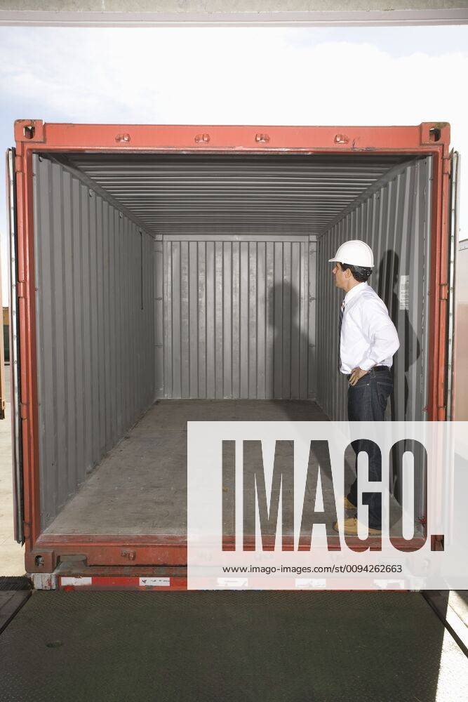 Man standing inside empty container,model released, Symbolfoto,property ...