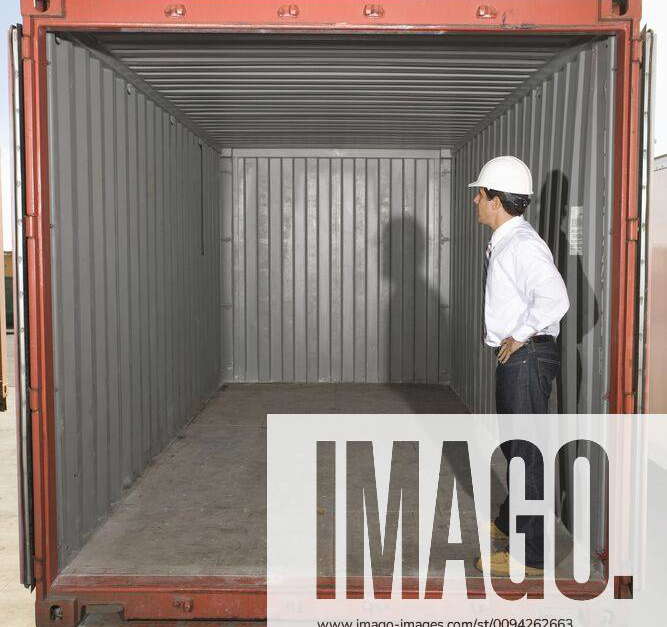 Man standing inside empty container,model released, Symbolfoto,property ...