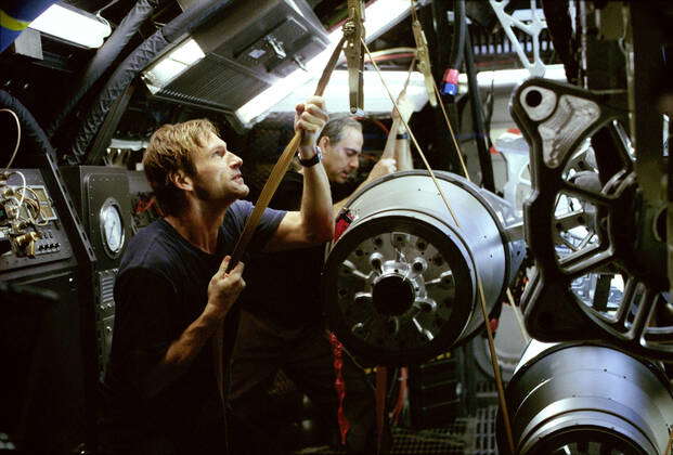 Aaron Eckhart & Stanley Tucci Characters: Dr. Josh Keyes & Dr. Conrad ...