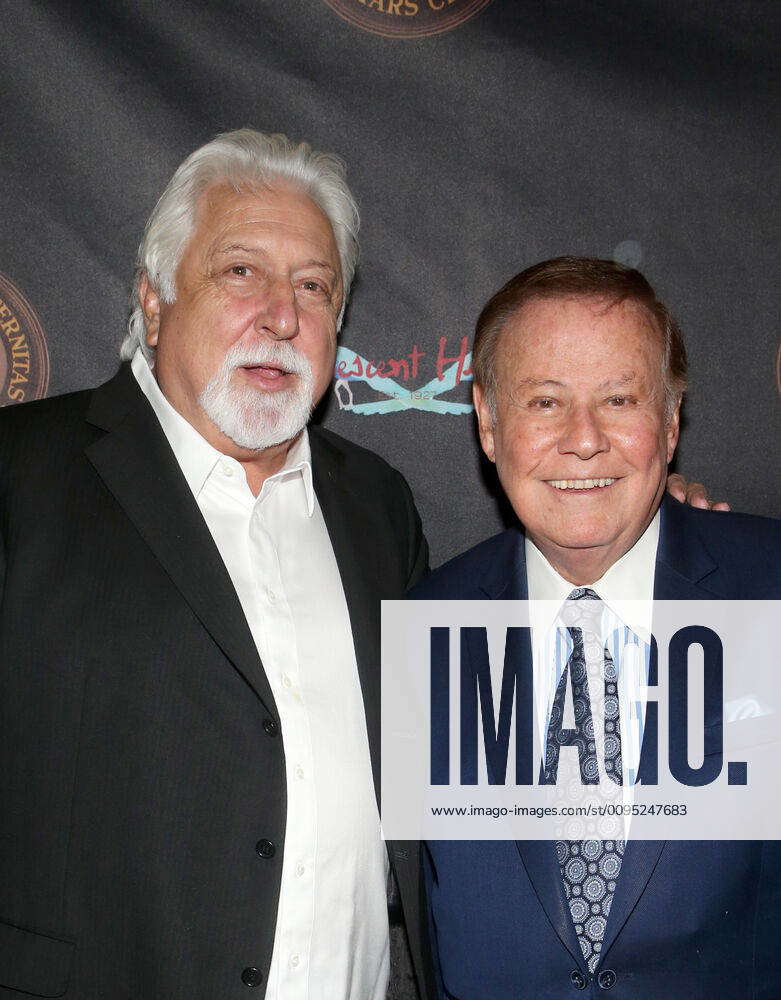 BEVERLY HILLS, CA - NOVEMBER 25: Michael Tadross, Marvin Scott, at ...