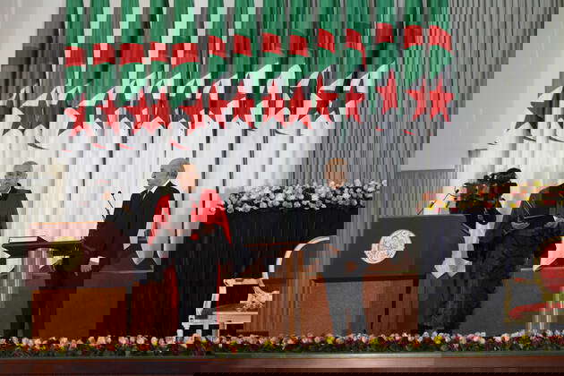 Algerian President Abdelmadjid Tebboune chairs a cabinet meeting, in ...