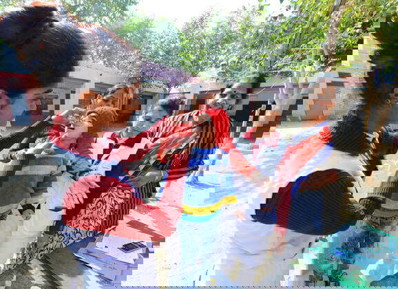 India: Pulse Polio Drop Campaign A child being administered pulse polio ...