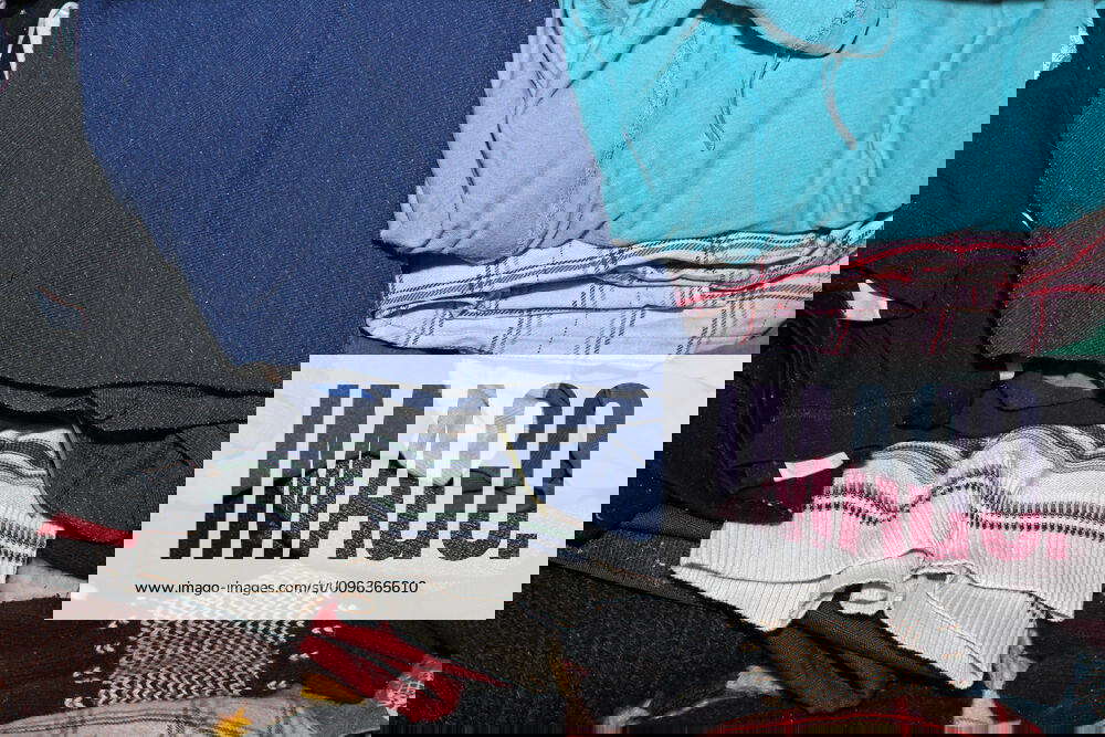 Common textiles in everyday life View into a well-filled wardrobe with ...