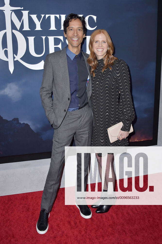 Danny Pudi with wife Bridget Showalter Pudi at the premiere of the ...