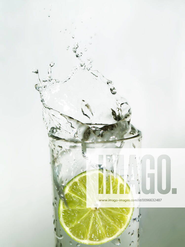 Lime slice in water Lime slice in a glass of water