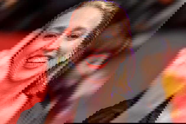 Actress Juliane Elting with me too and Time s Up Ring shows middle ...